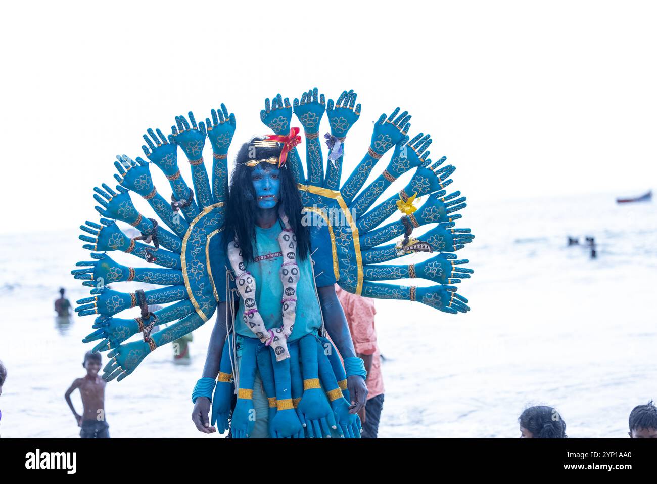 Kulasai, Portrait of indian hindu devotee with painted face and dressed ...
