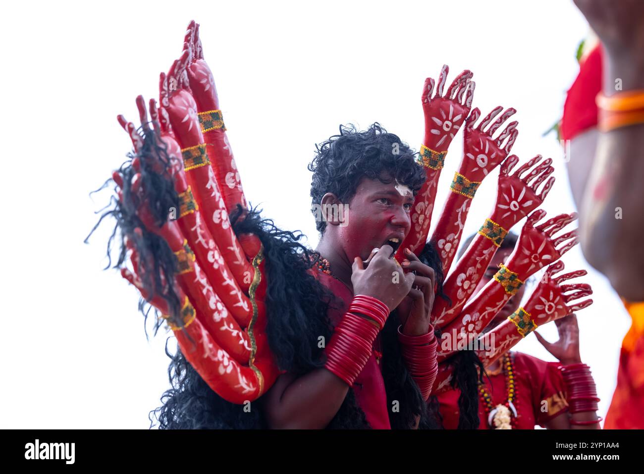 Kulasai, Portrait of indian hindu devotee with painted face and dressed ...