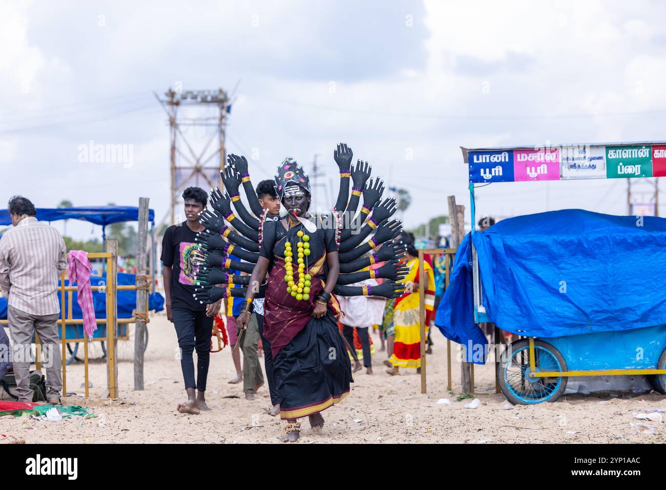 Kulasai, Portrait of indian hindu devotee with painted face and dressed ...
