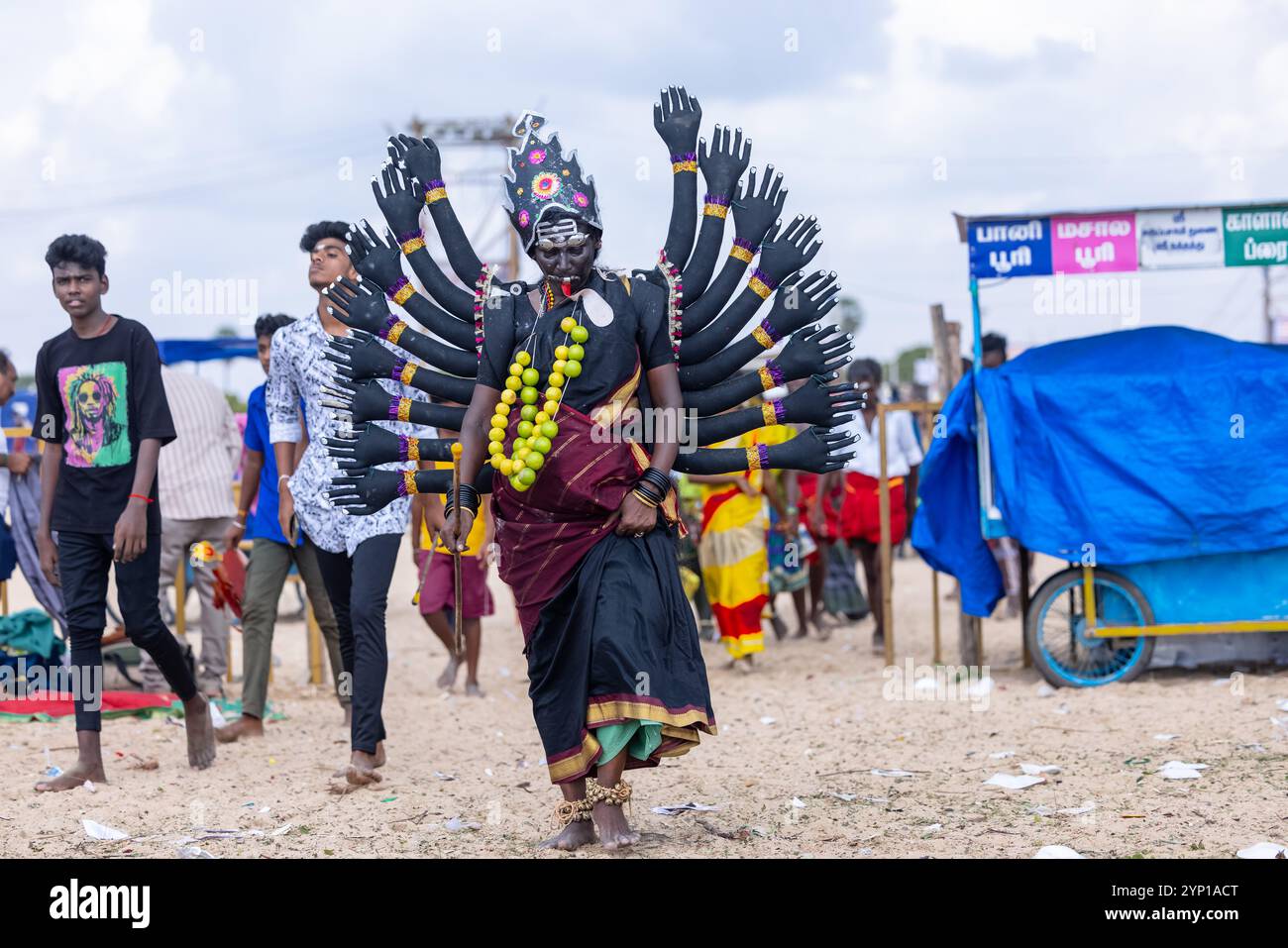 Kulasai, Portrait of indian hindu devotee with painted face and dressed ...