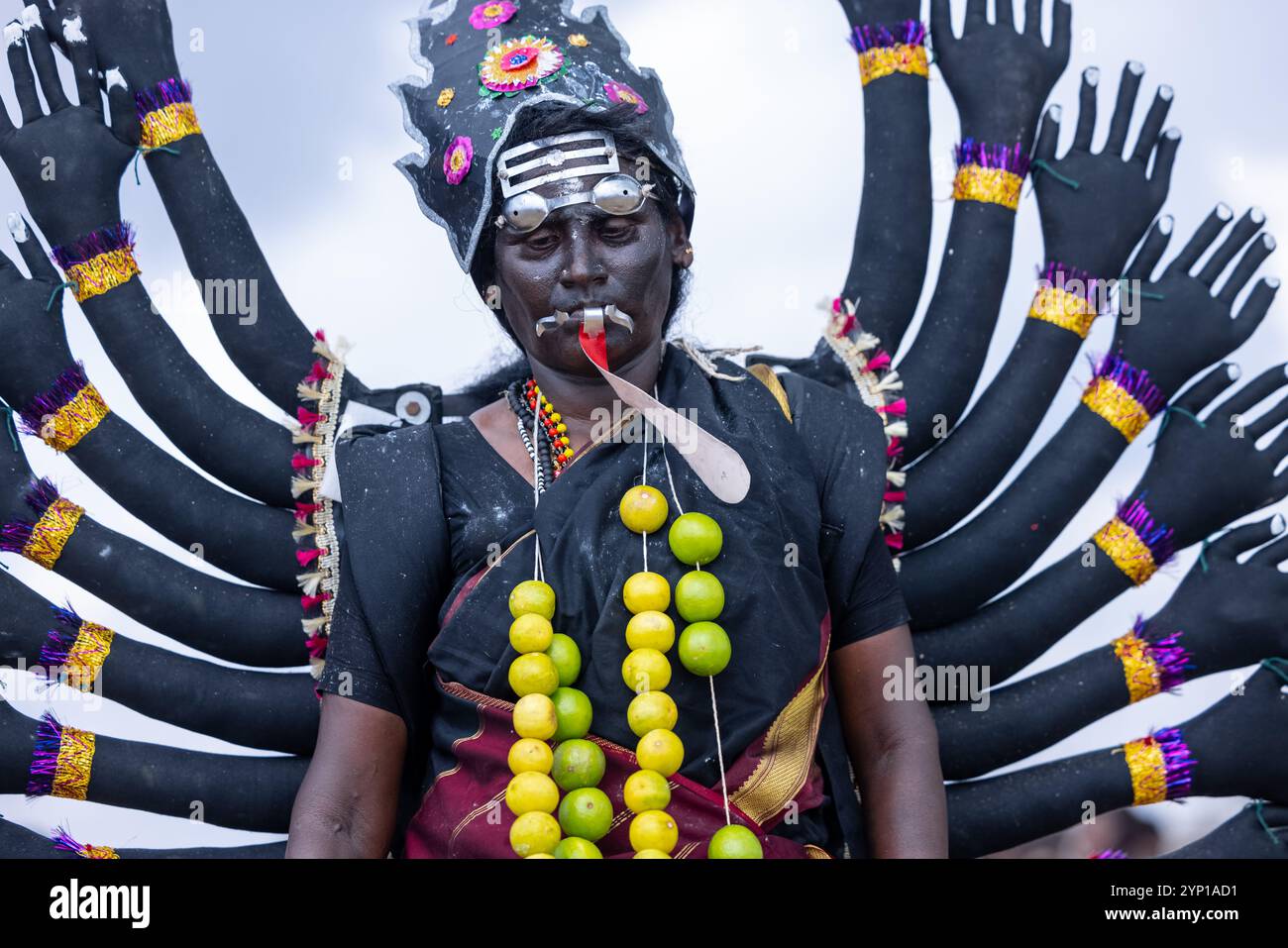 Kulasai, Portrait of indian hindu devotee with painted face and dressed ...