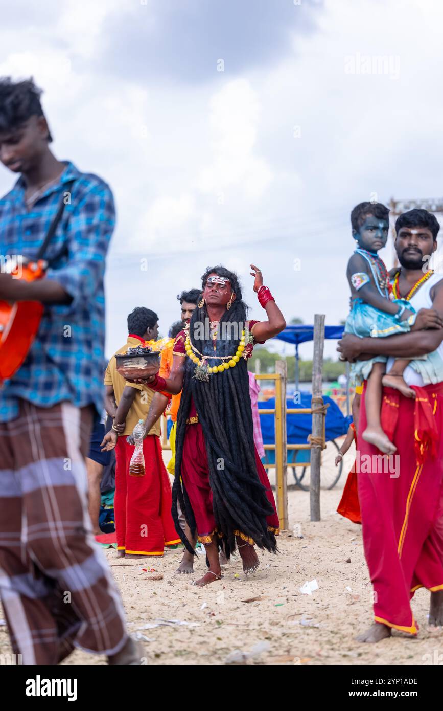 Kulasai, Portrait of indian hindu devotee with painted face and dressed ...