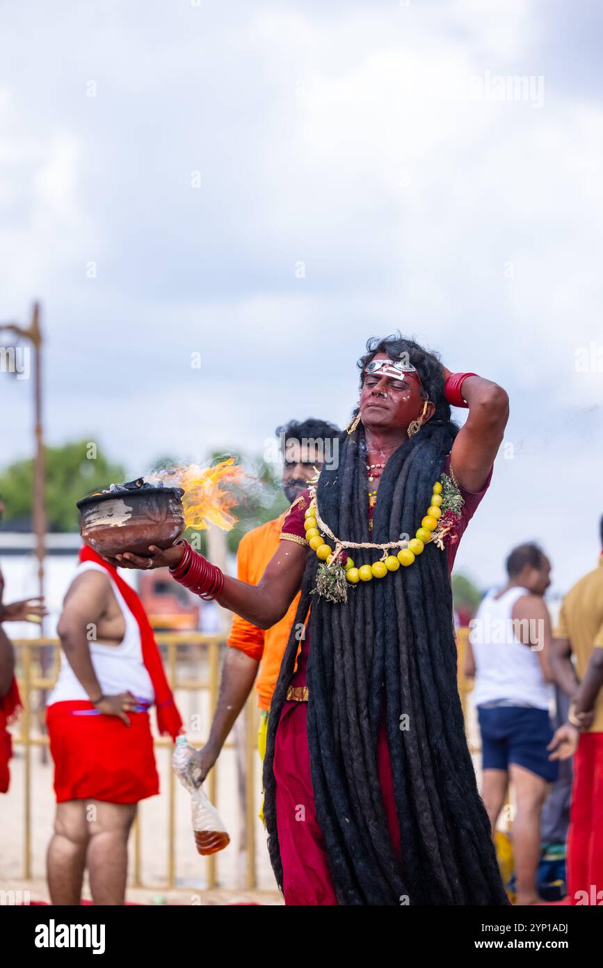 Kulasai, Portrait of indian hindu devotee with painted face and dressed ...