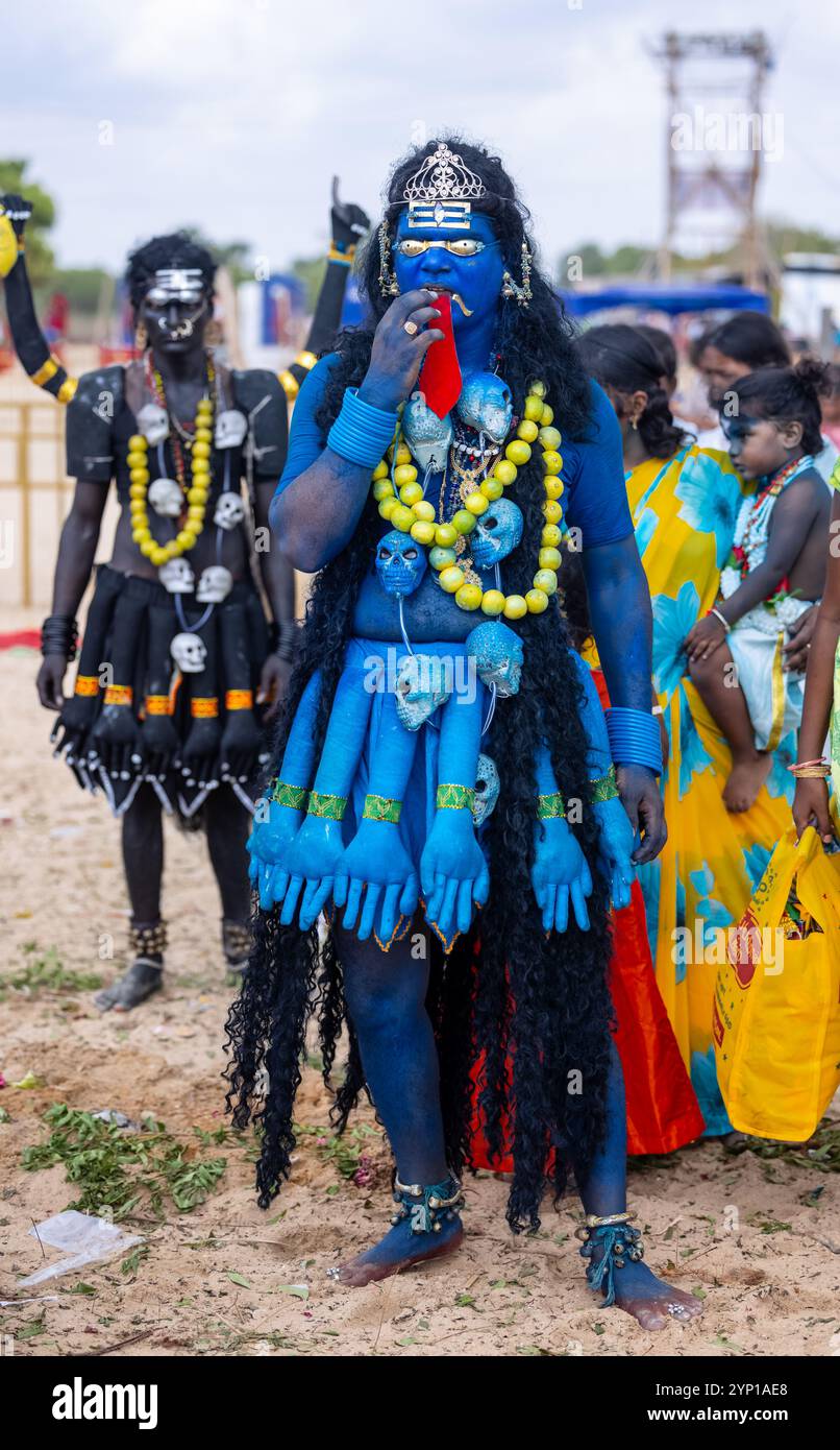 Kulasai, Portrait of indian hindu devotee with painted face and dressed ...