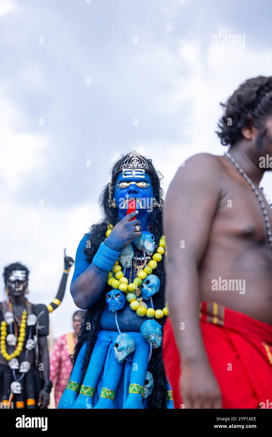 Kulasai, Portrait of indian hindu devotee with painted face and dressed ...