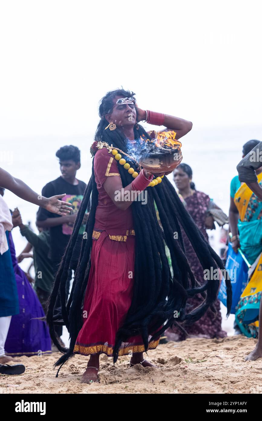 Kulasai, Portrait of indian hindu devotee with painted face and dressed ...