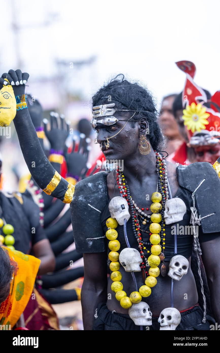 Kulasai, Portrait of indian hindu devotee with painted face and dressed ...
