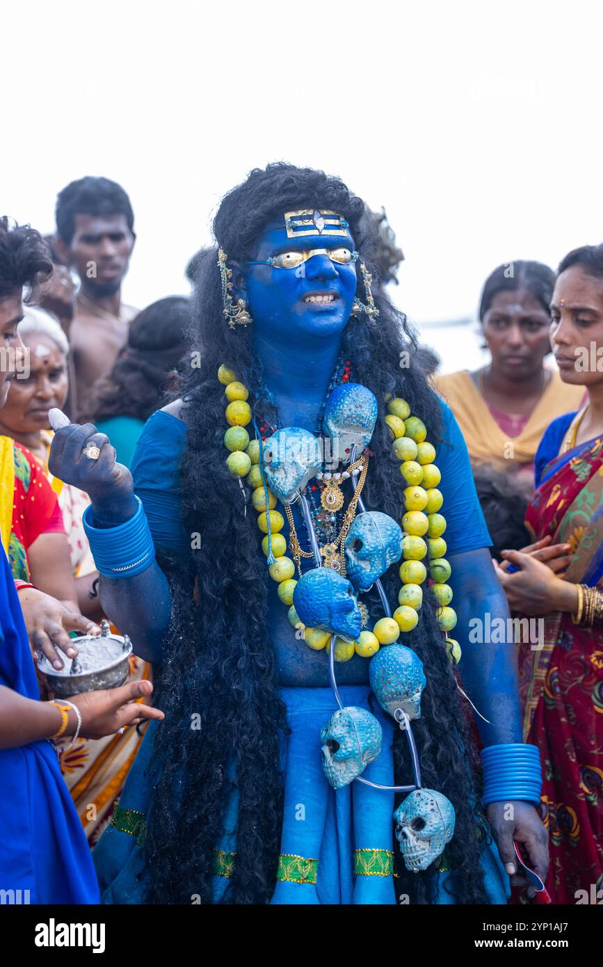 Kulasai, Portrait of indian hindu devotee with painted face and dressed ...