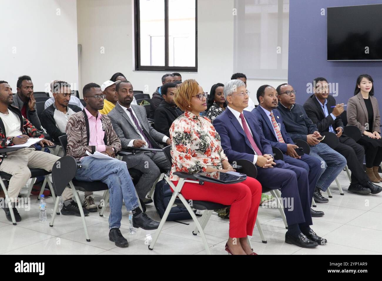 Addis Ababa, Ethiopia. 26th Nov, 2024. Guests and students attend the ...