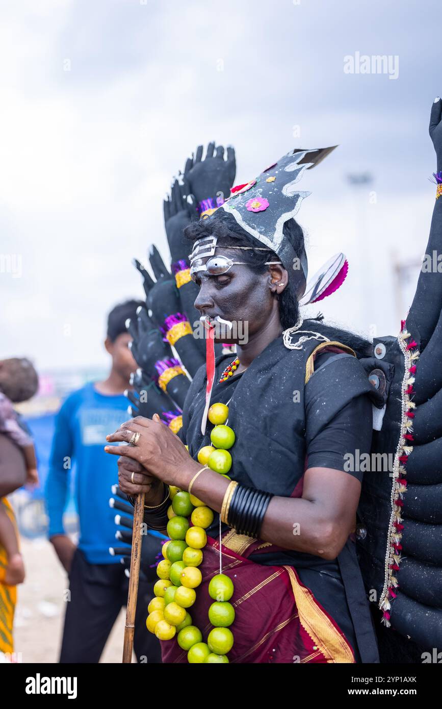 Kulasai, Portrait of indian hindu devotee with painted face and dressed ...