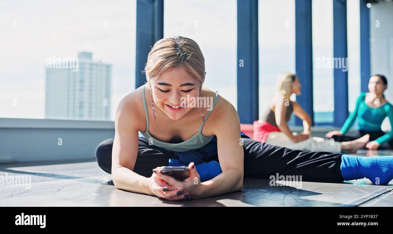 Dancer, stretch and woman with smartphone in class, browsing social ...
