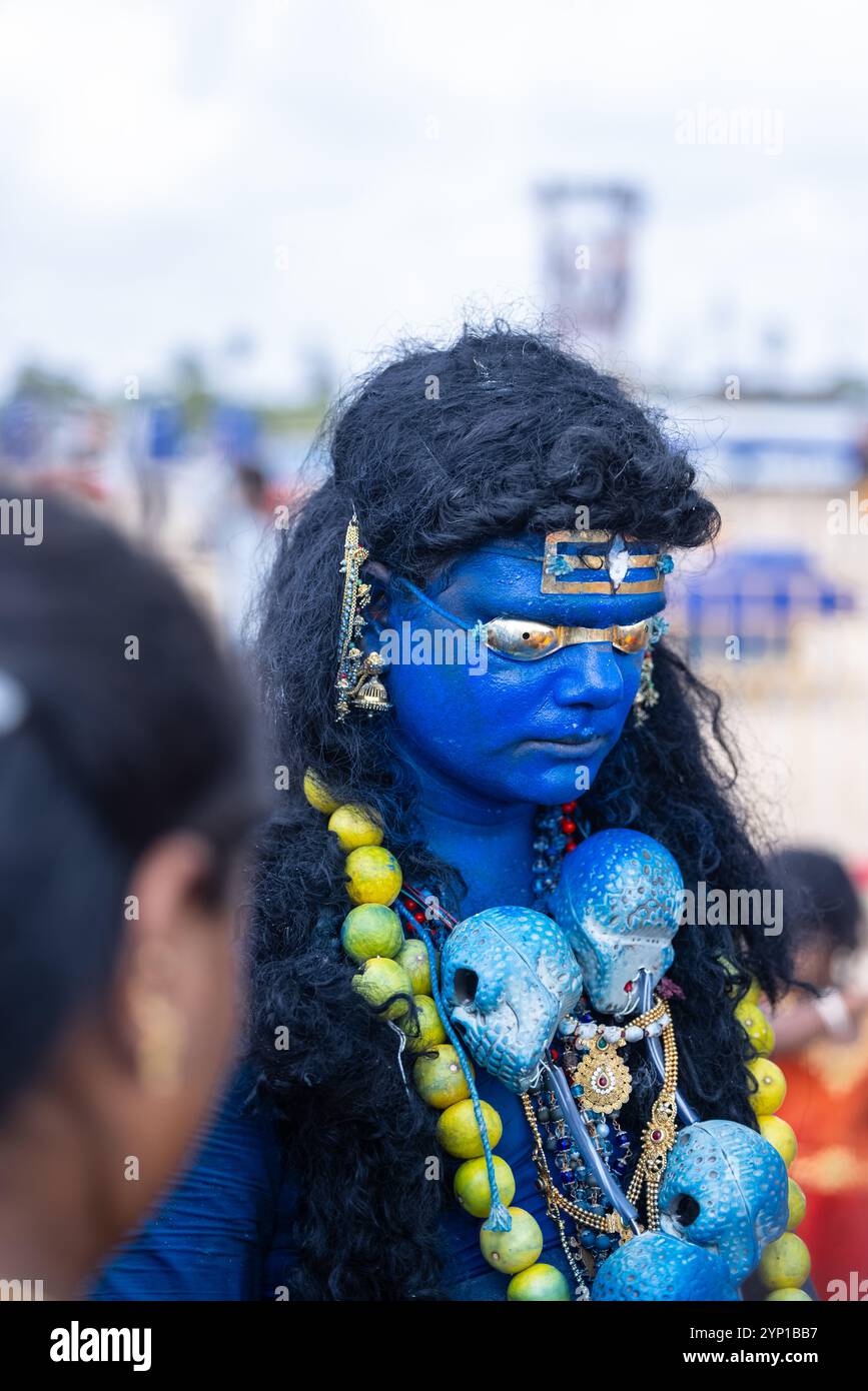 Kulasai, Portrait of indian hindu devotee with painted face and dressed ...