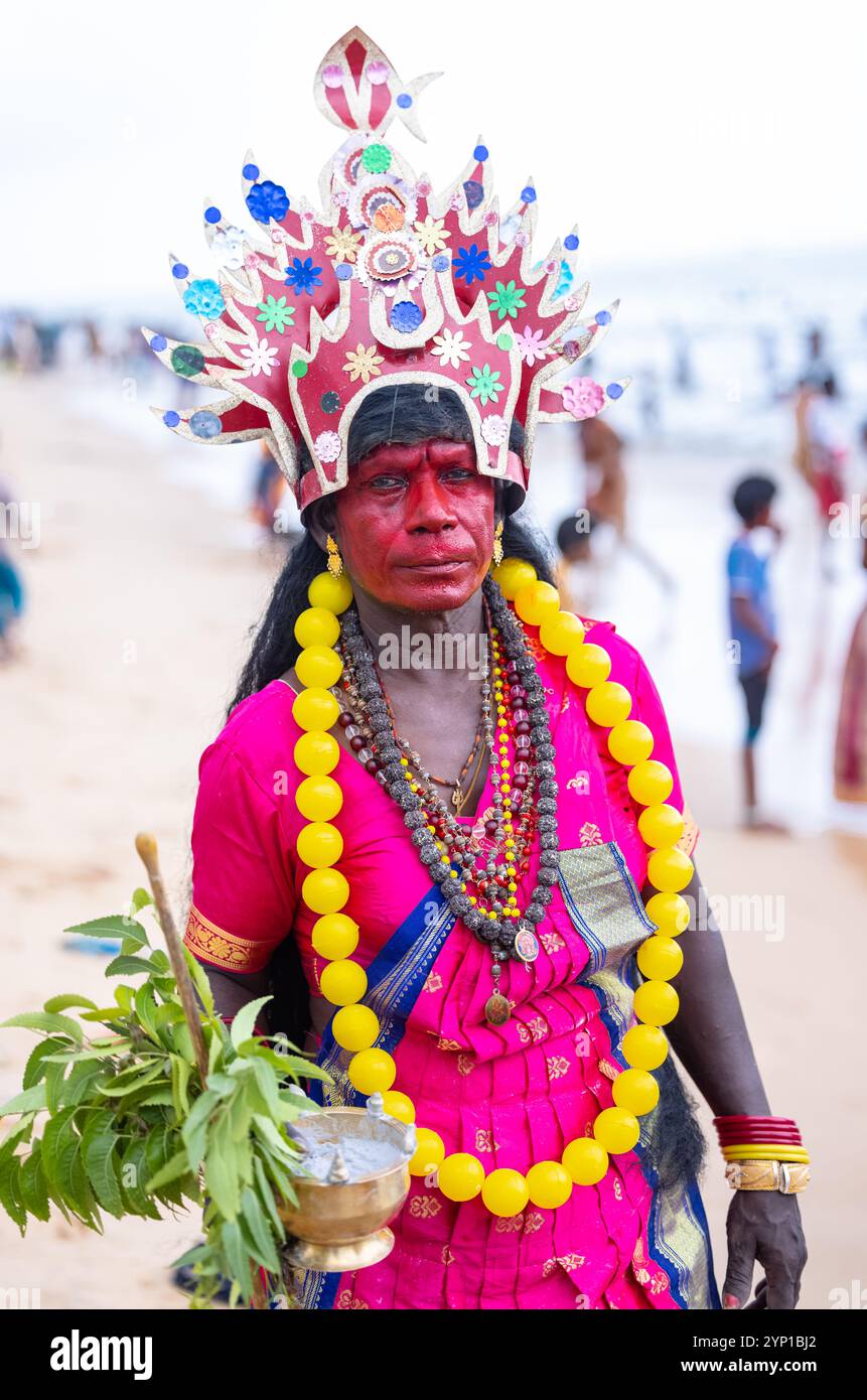 Kulasai, Portrait of indian hindu devotee with painted face and dressed ...