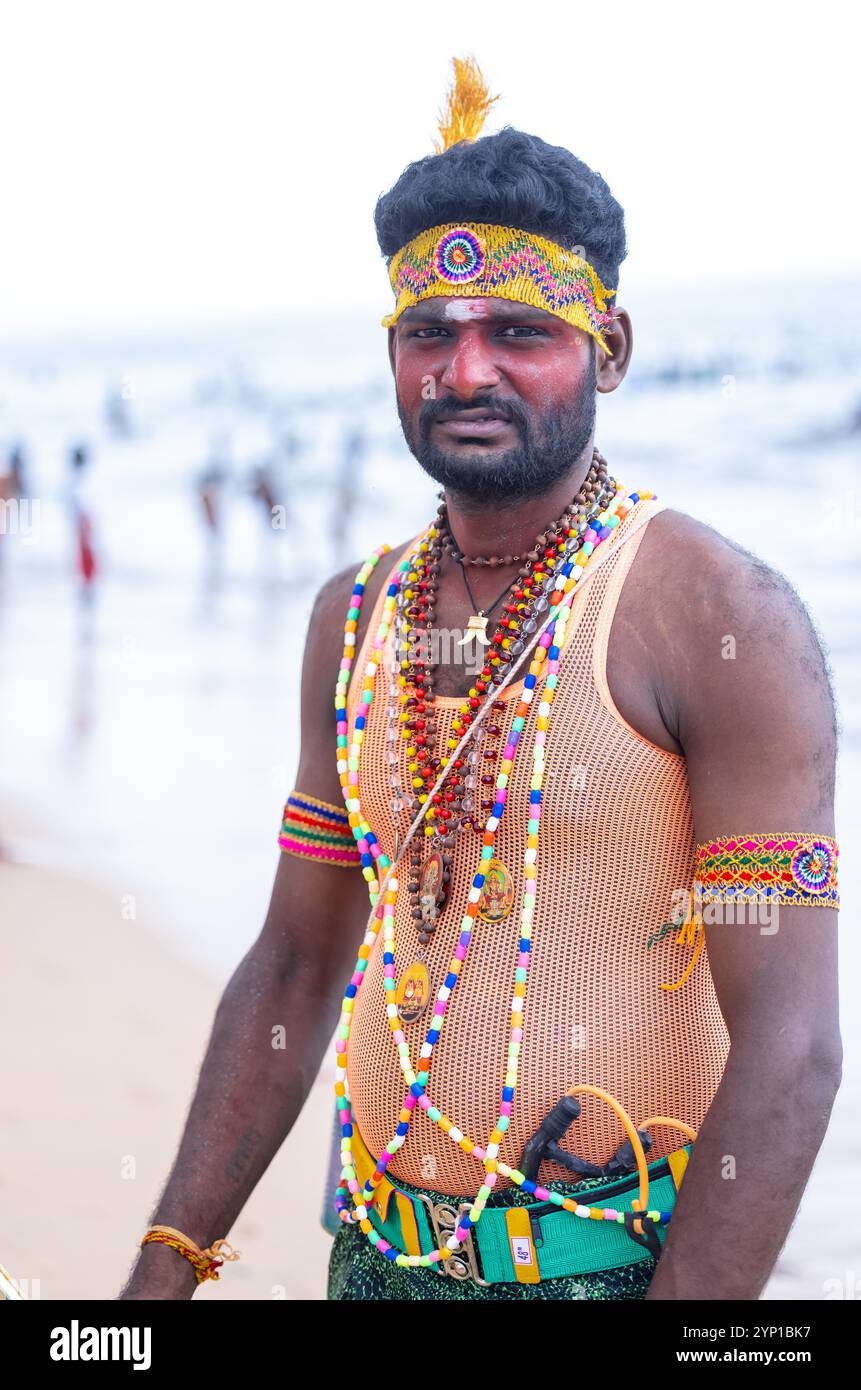 Kulasai, Portrait of indian hindu devotee with painted face and dressed ...