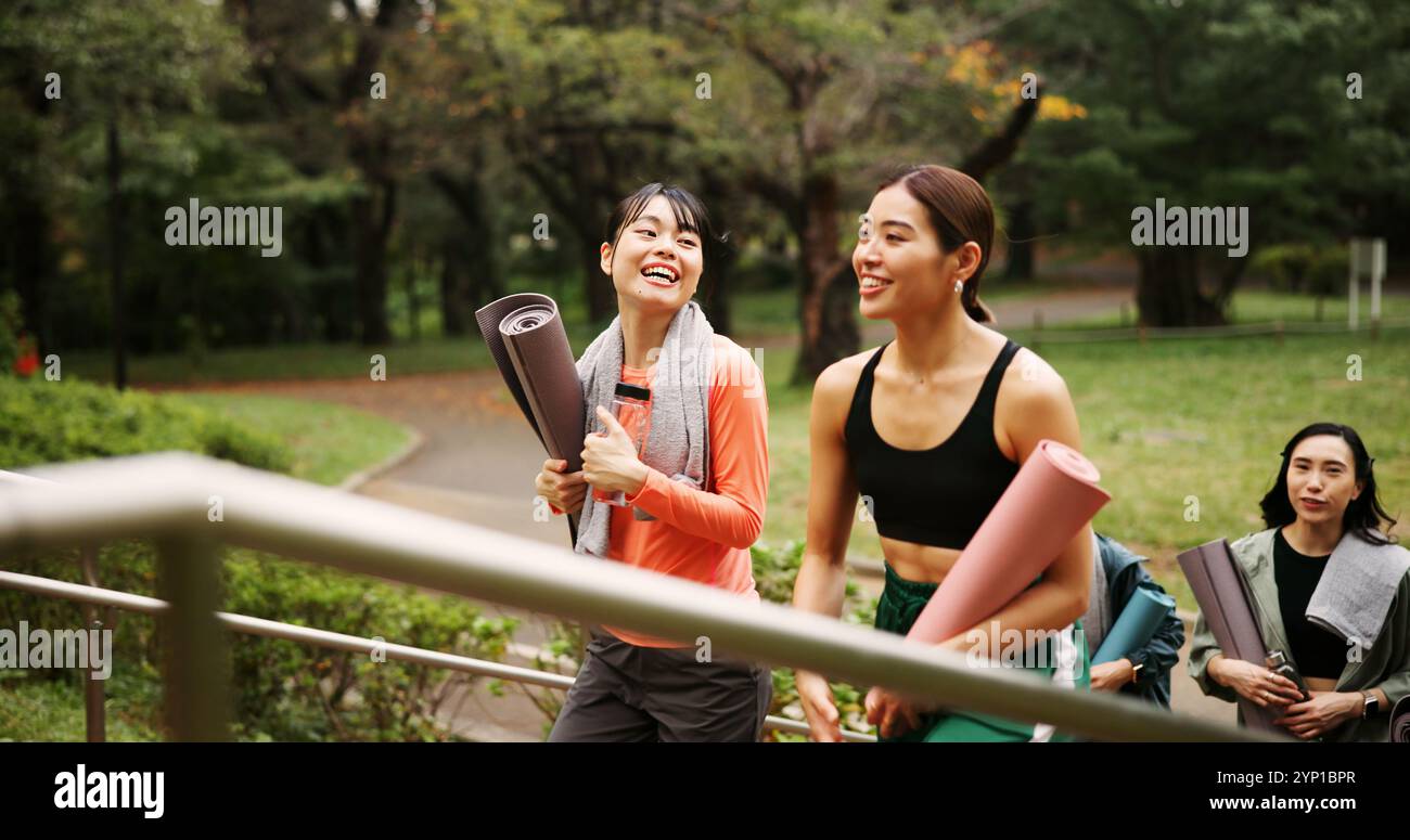 Walking, stairs and friends in nature for yoga with conversation for ...