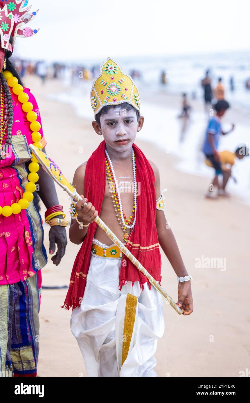 Kulasai, Portrait of indian hindu devotee with painted face and dressed ...