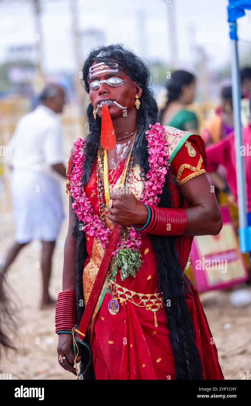 Kulasai, Portrait of indian hindu devotee with painted face and dressed ...