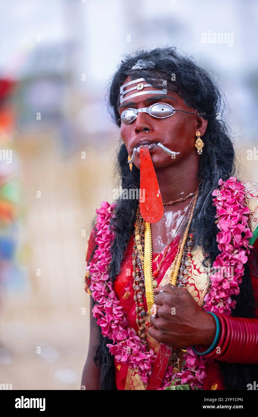 Kulasai, Portrait of indian hindu devotee with painted face and dressed ...