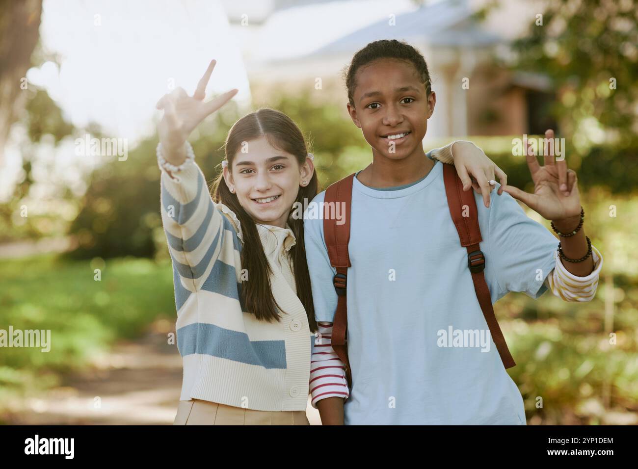 Teen Friends Posing For Portrait Outdoors Stock Photo - Alamy