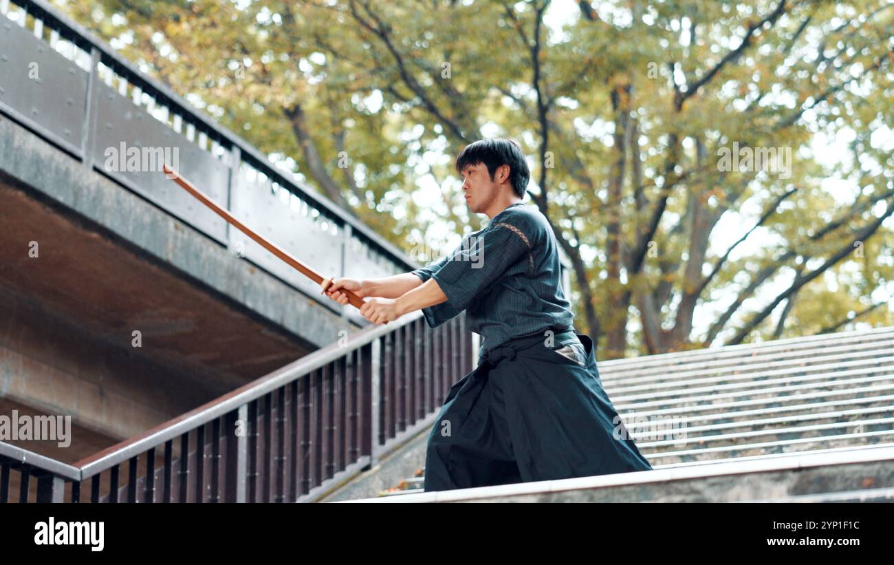 City, bamboo sword and Asian man for martial arts, Kendo practice and ...