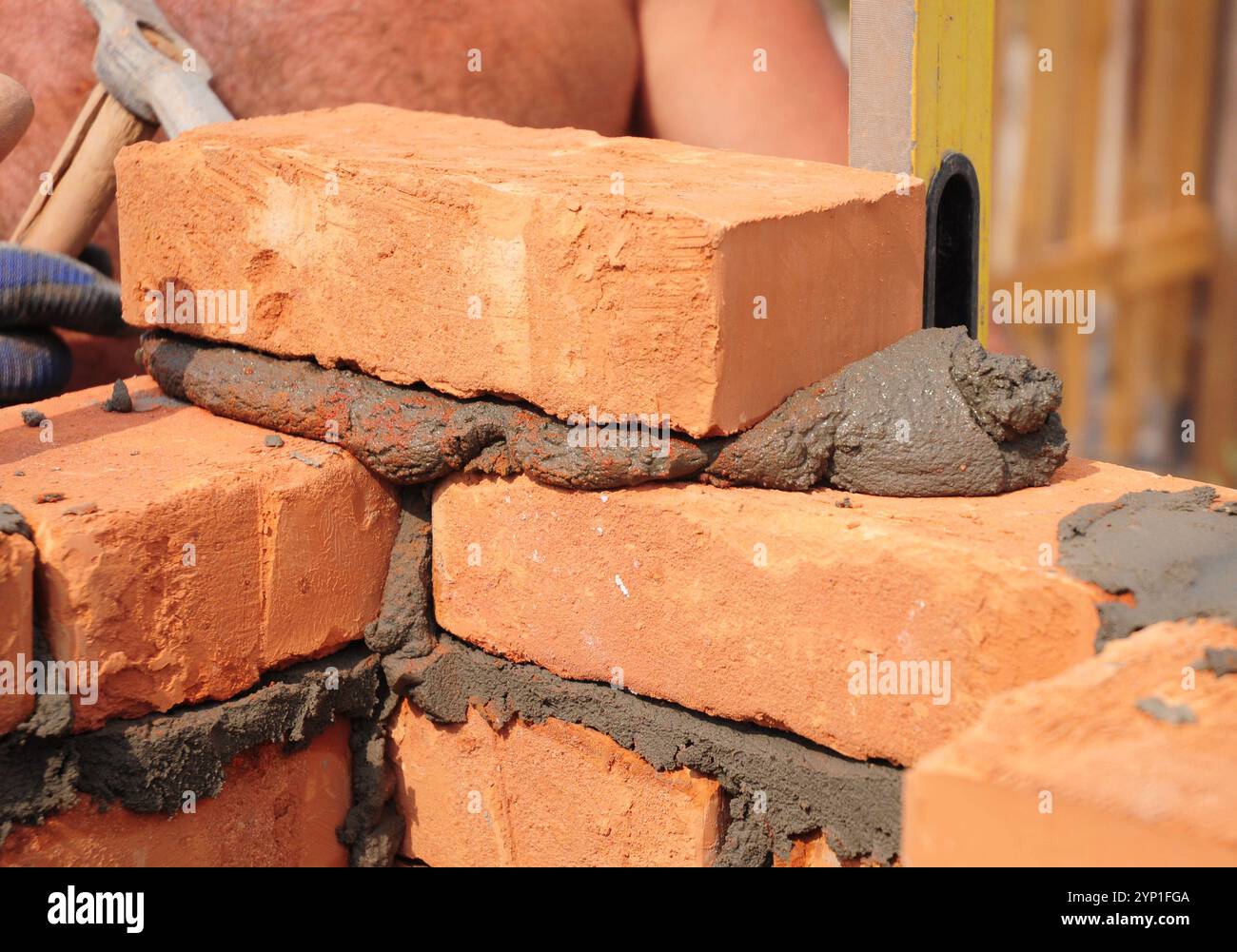 Bricklayer laying bricks hi-res stock photography and images - Alamy
