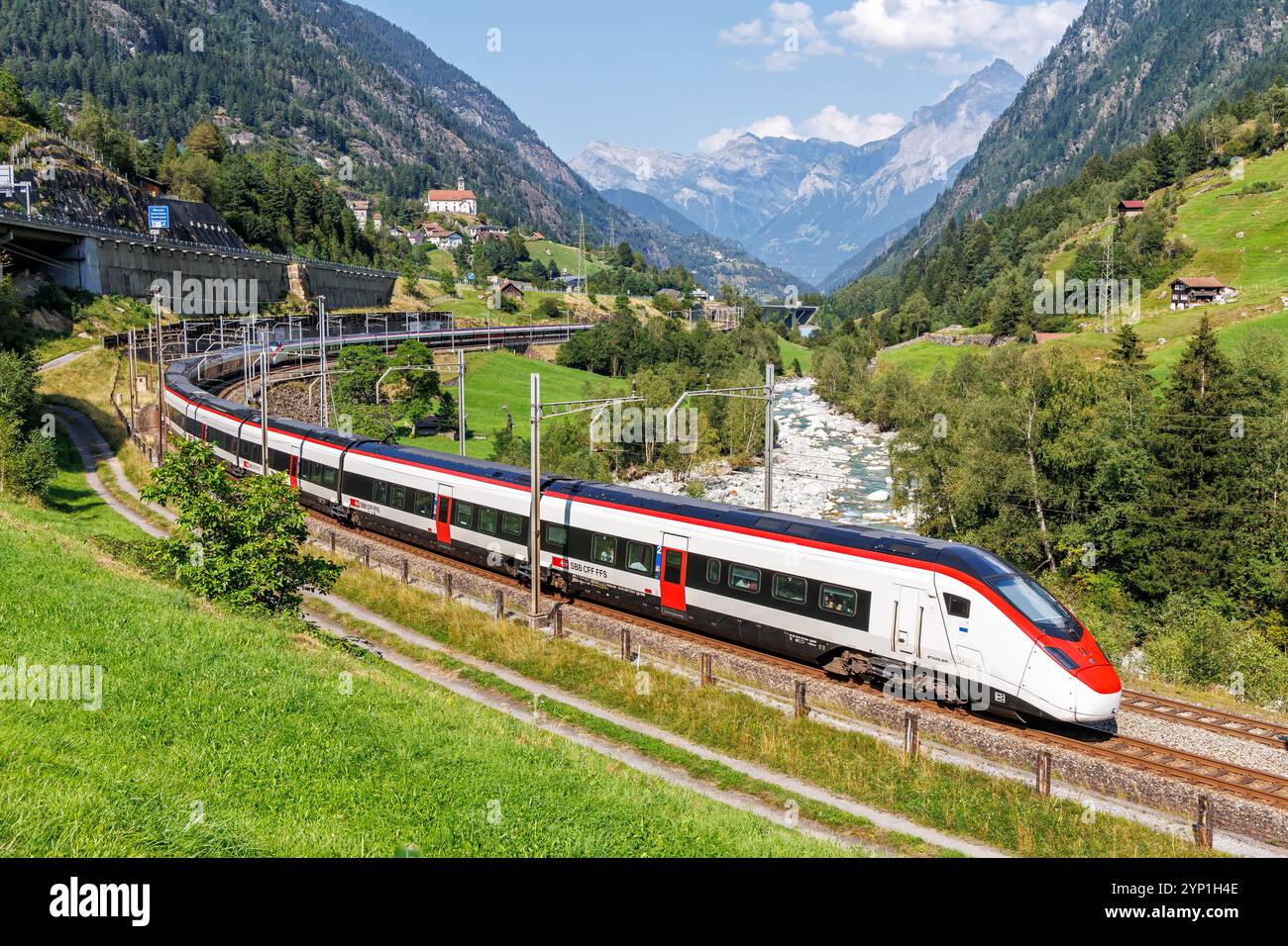 Wassen, Switzerland - August 28, 2024: Passenger train type Stadler ...