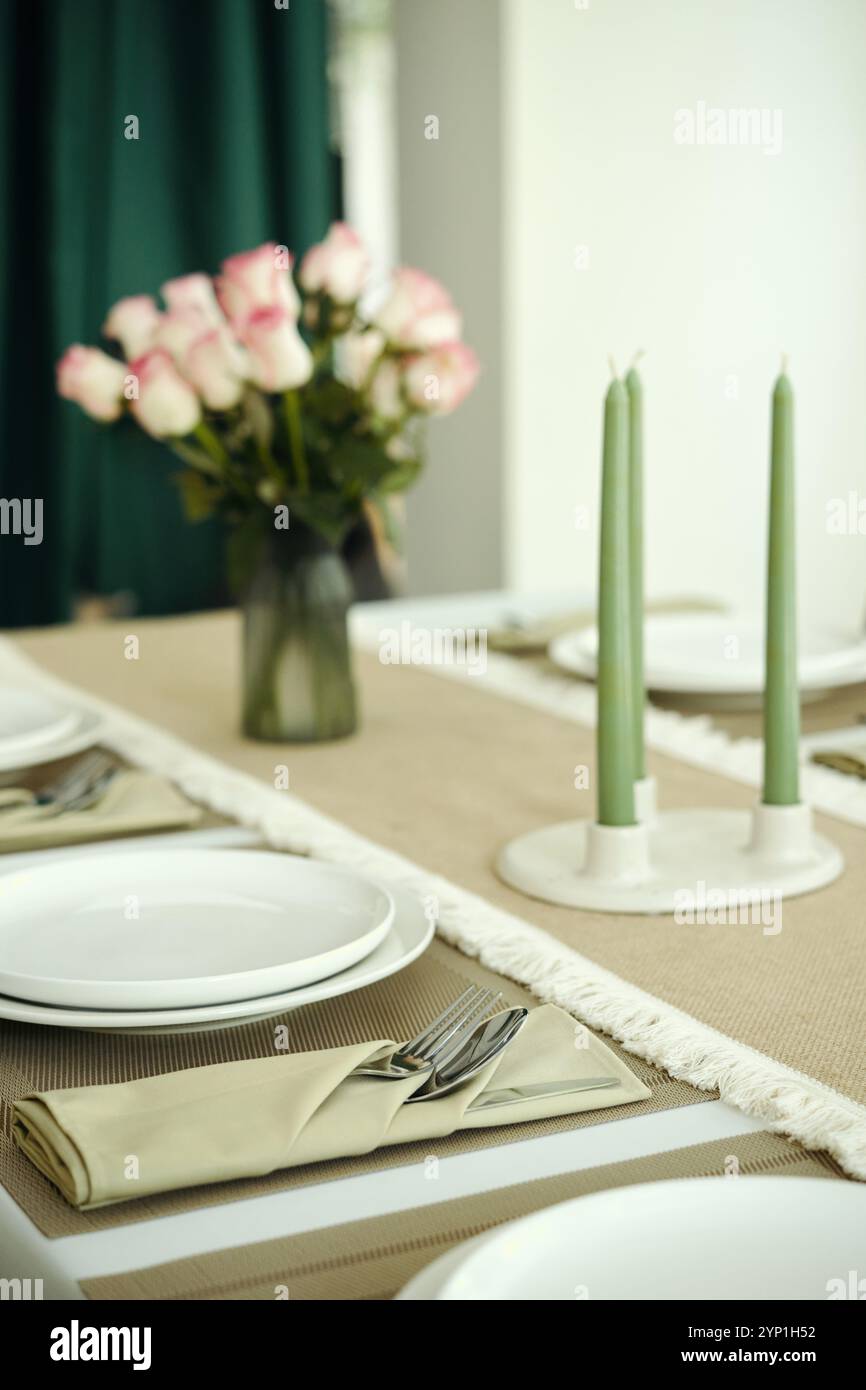 Arranging Elegantly Set Dining Table with Floral Centerpiece Stock ...