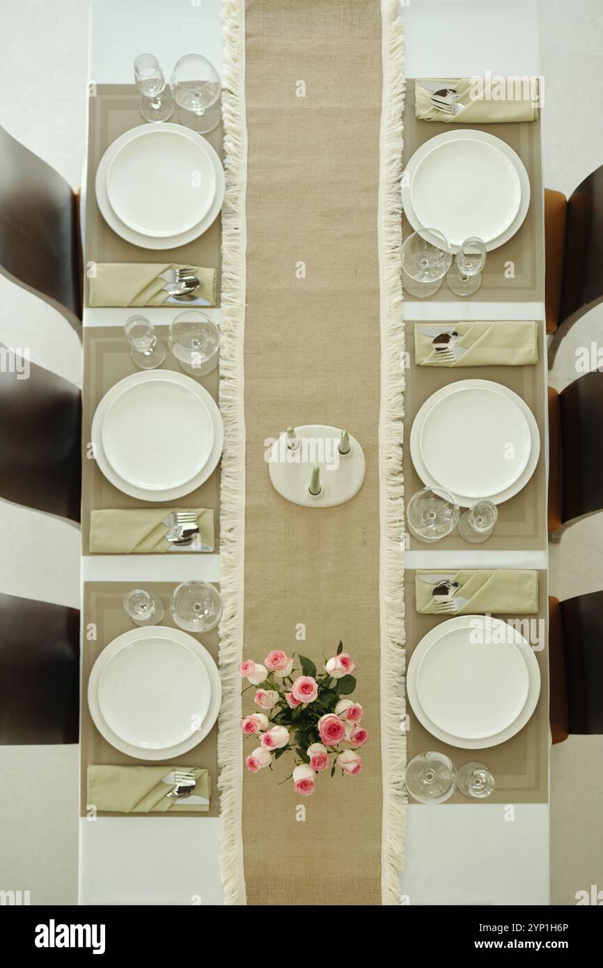 Elegant Dining Table Setting with Floral Centerpiece Stock Photo - Alamy
