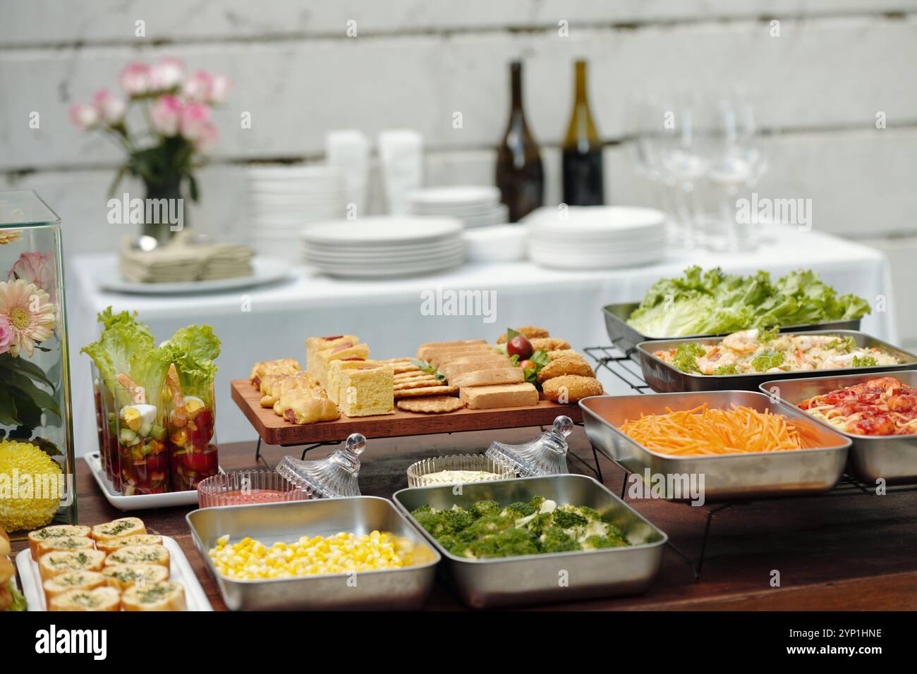 Displaying Assorted Buffet Table with Various Dishes Stock Photo - Alamy