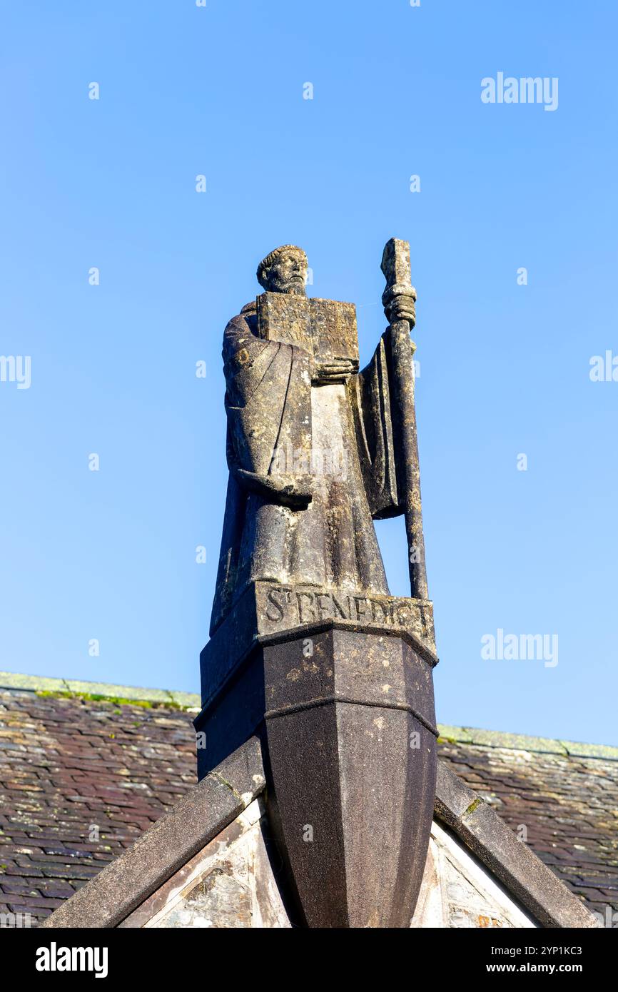 Church statue sculpture Saint Benedict against blue sky with copy space ...
