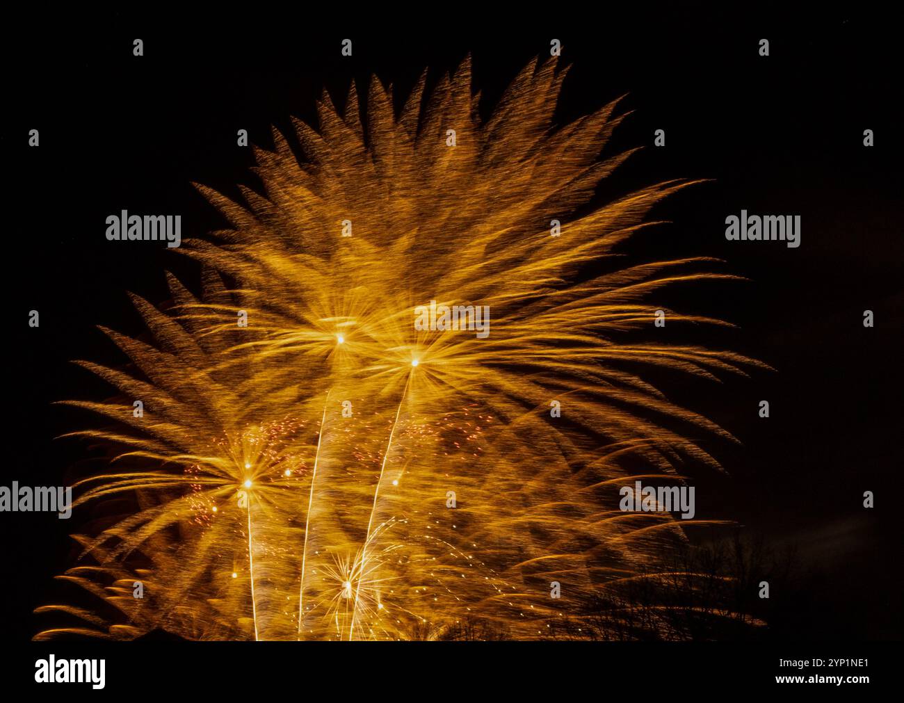 Explosion of fireworks in the night sky on bonfire night in November ...