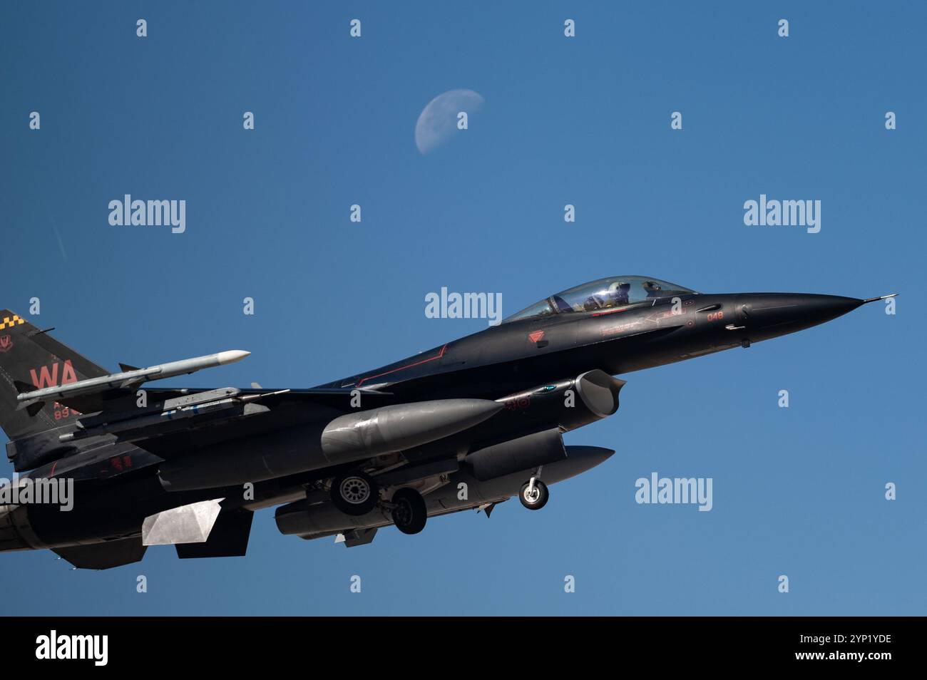 An F-16 Fighting Falcon assigned to the 64th Aggressor Squadron takes ...