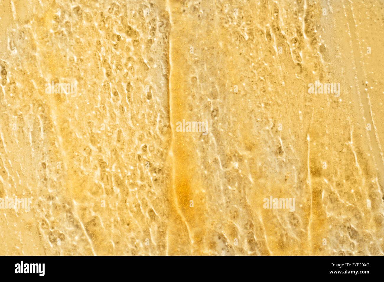 Gold gel rectangle smear closeup on white background Stock Photo - Alamy