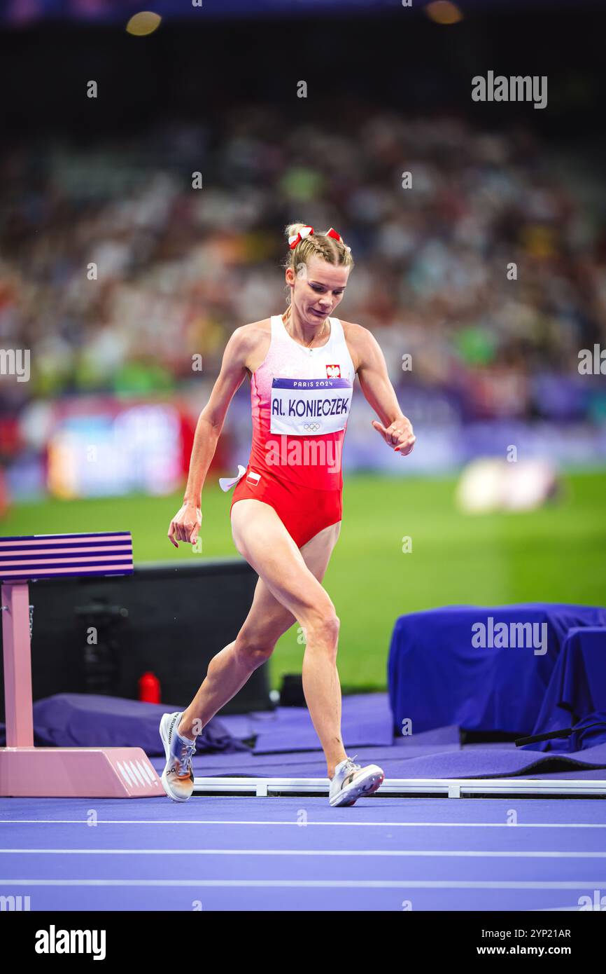 Alicja Konieczek participating in the 3000 metres steeplechase at the Paris 2024 Olympic Games ...