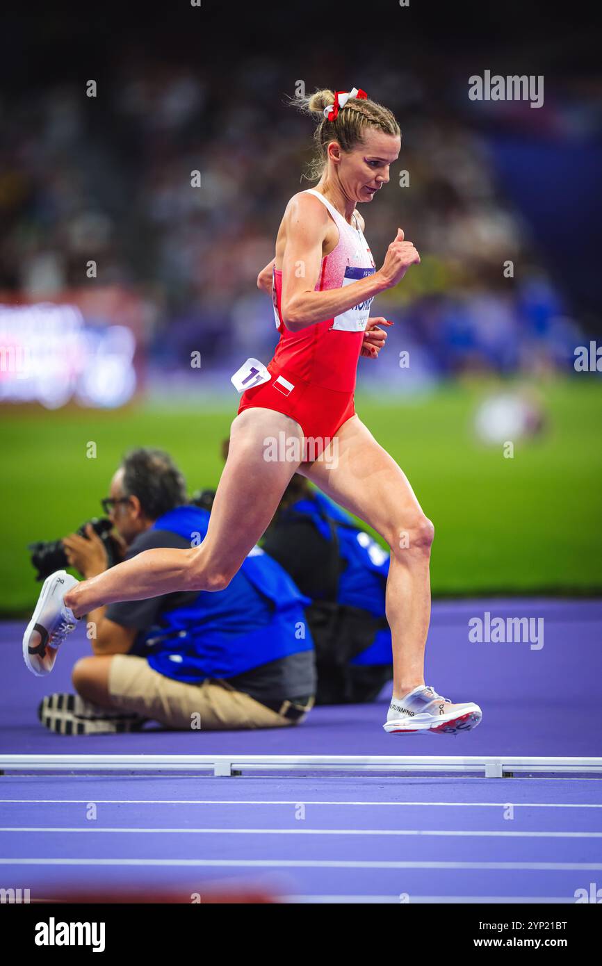Alicja Konieczek participating in the 3000 metres steeplechase at the Paris 2024 Olympic Games ...