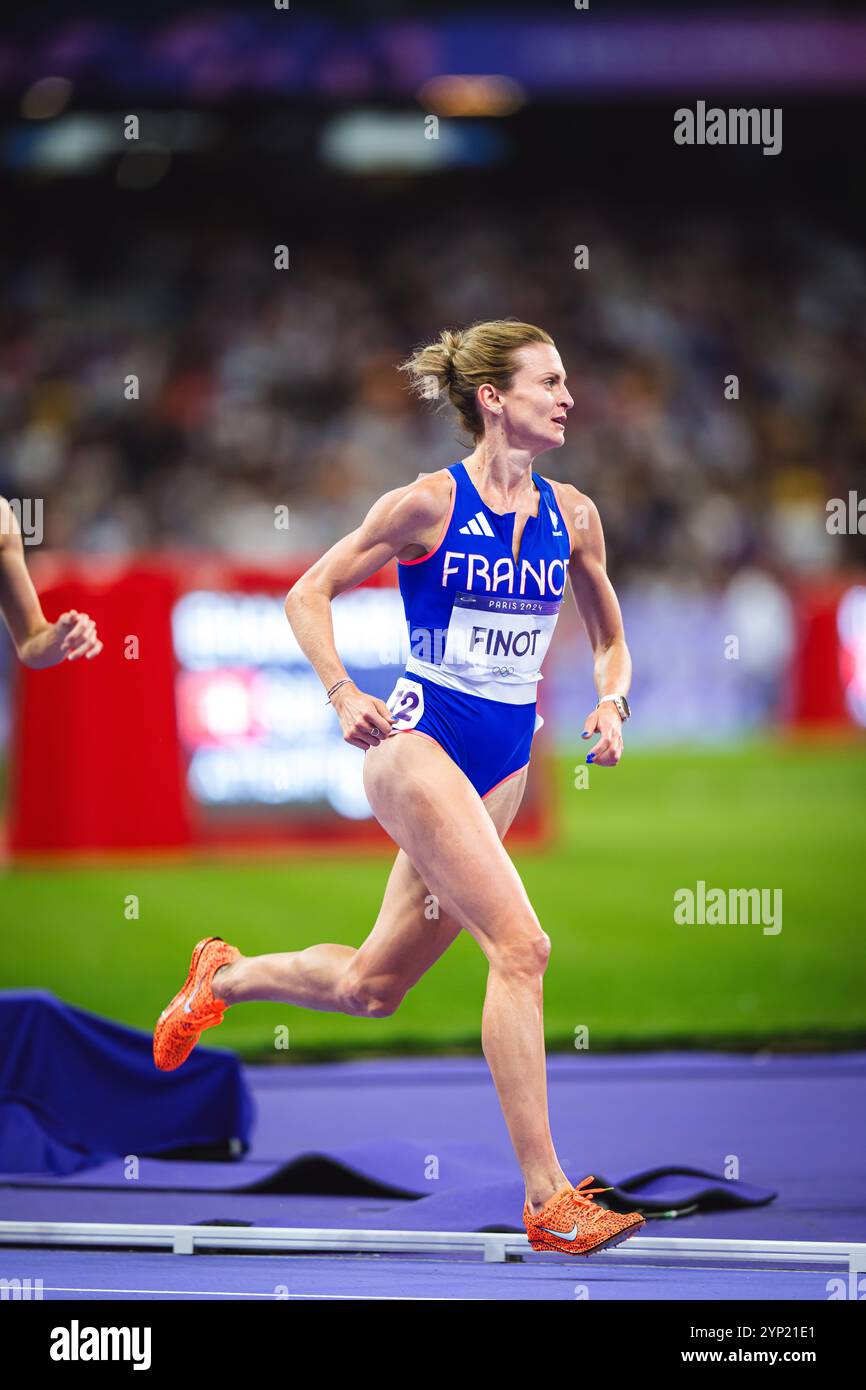 Alice Finot participating in the 3000 metres steeplechase at the Paris ...