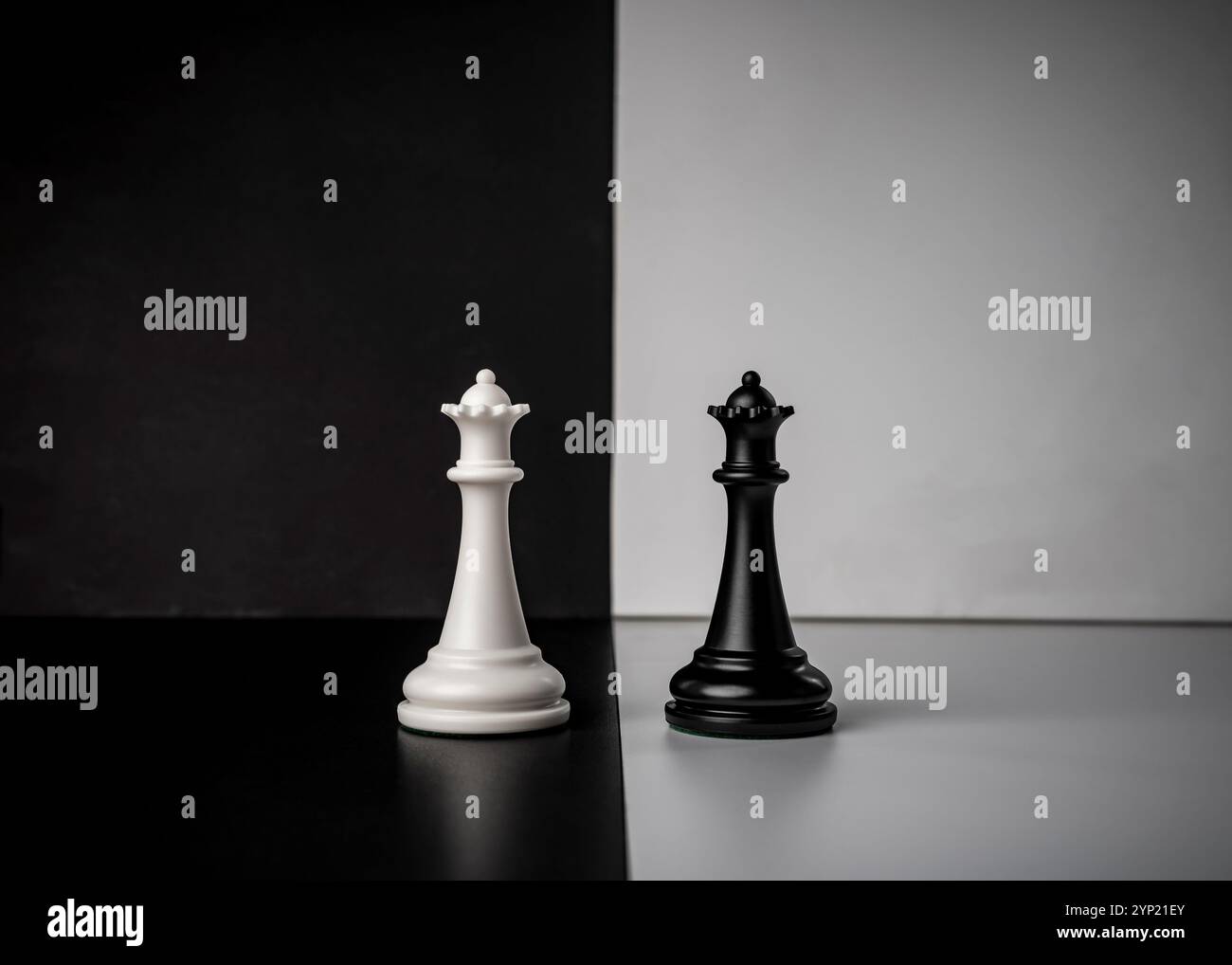 Conceptual Composition With Chess Pieces In Dramatic Light Duality