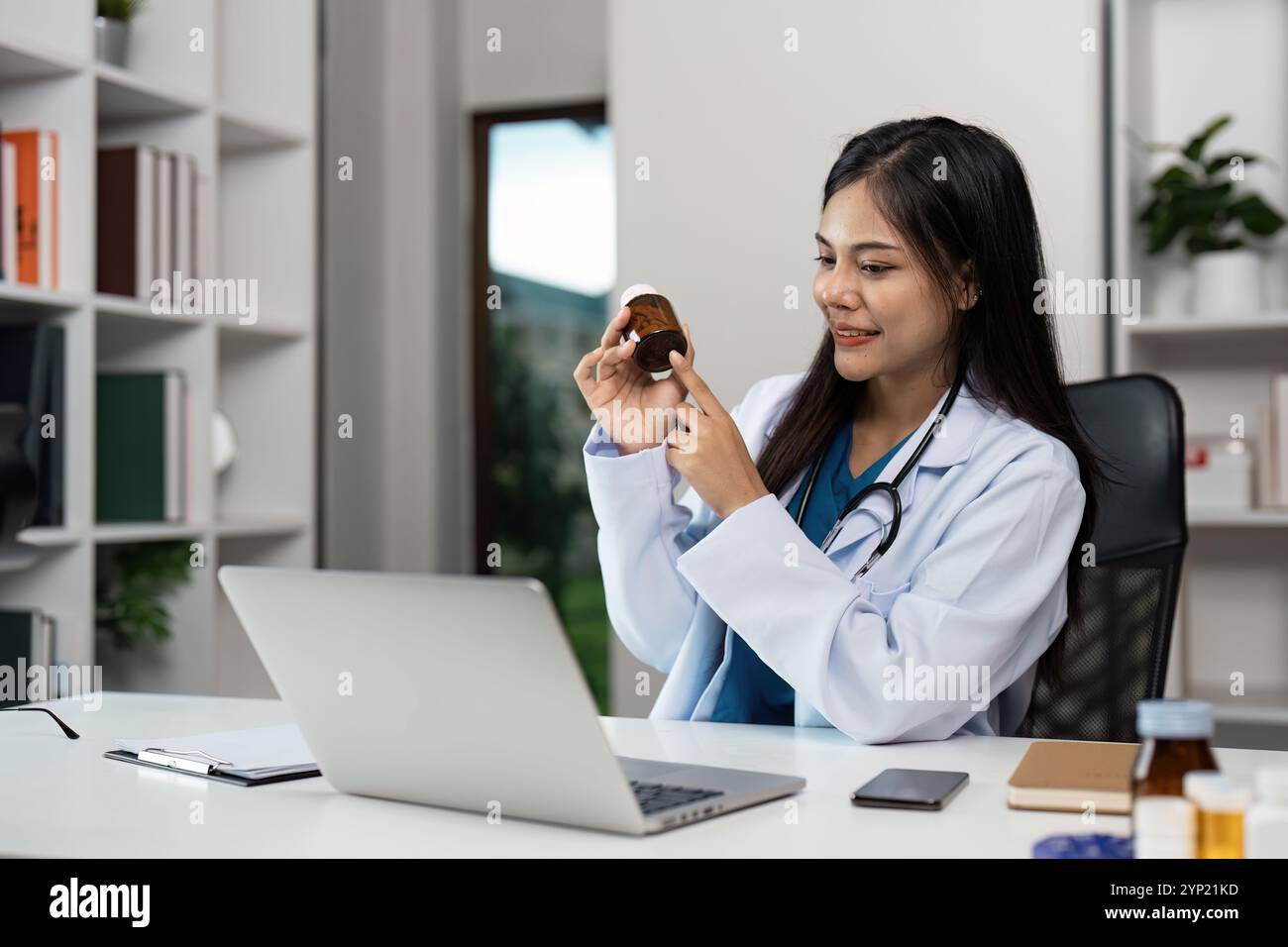 Female Doctor Explaining Medication Online During Virtual Consultation ...