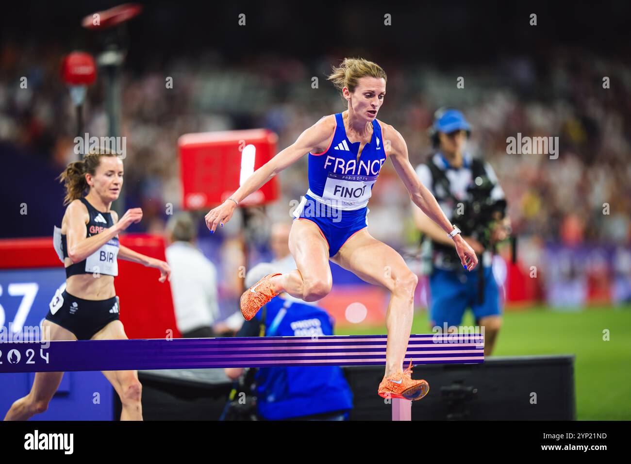 Alice Finot participating in the 3000 metres steeplechase at the Paris ...