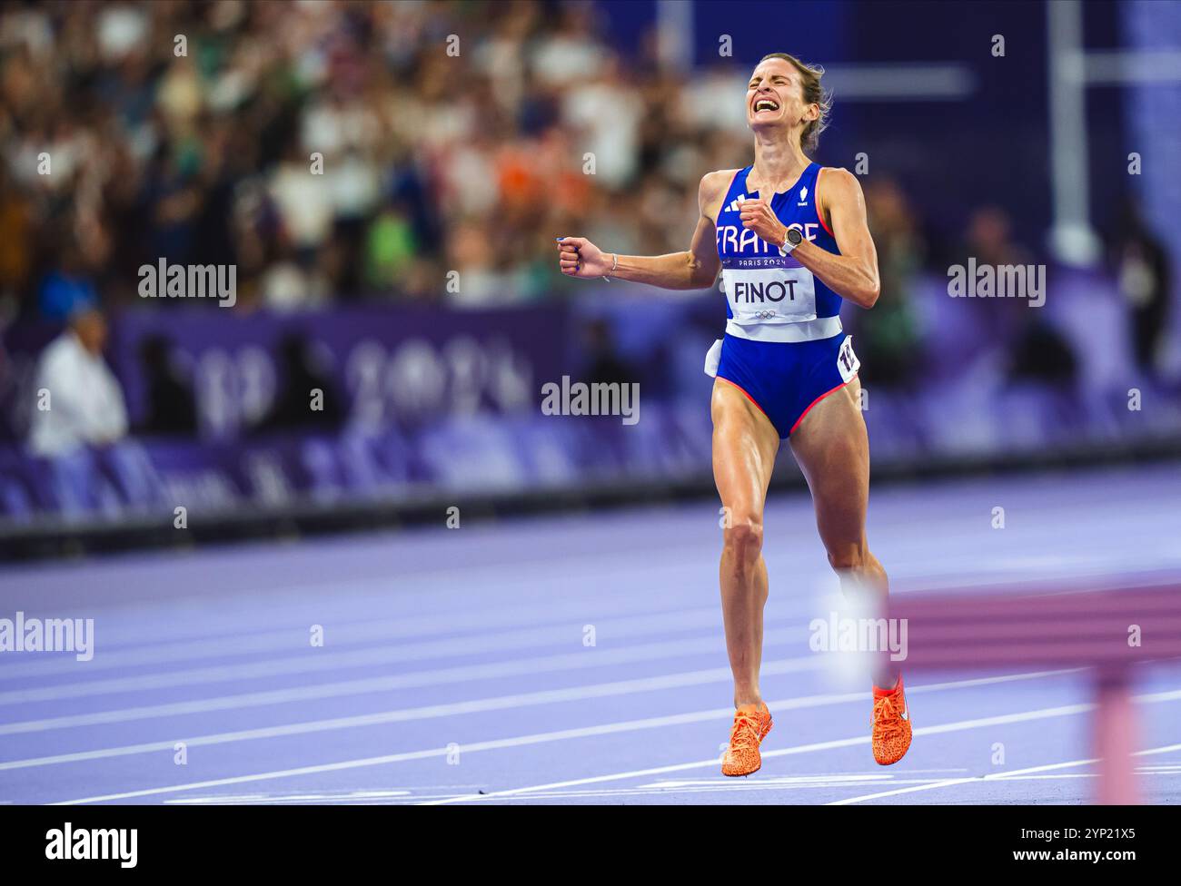 Alice Finot participating in the 3000 metres steeplechase at the Paris ...