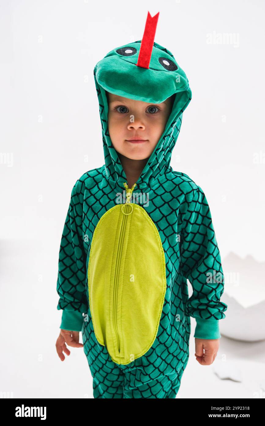 Child in a snake costume in an egg Stock Photo - Alamy
