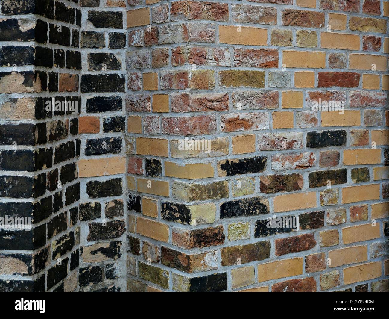 Church wall has been renovated: different bricks have color nuances ...