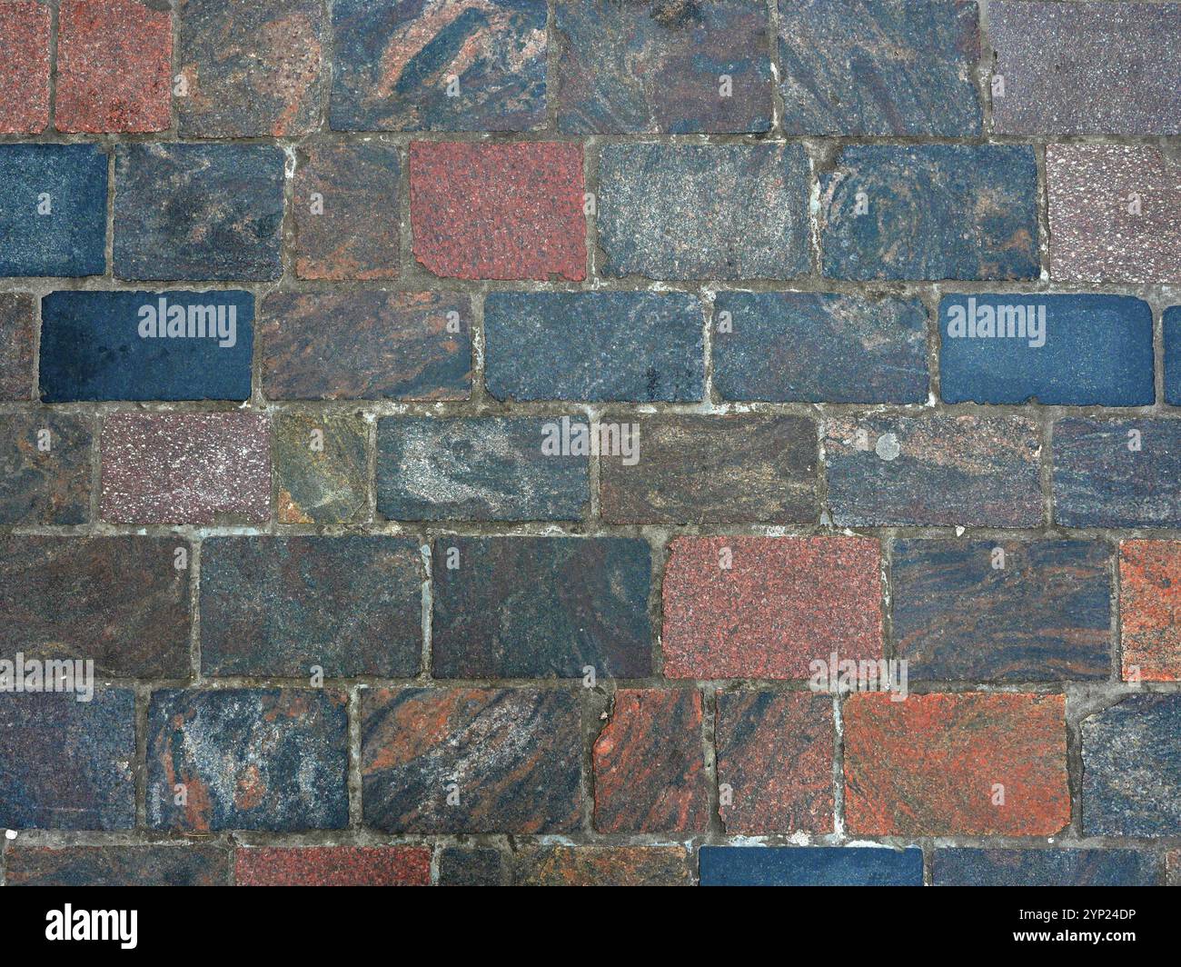 Street paving - granite paving - colorful in a pedestrian zone. The ...
