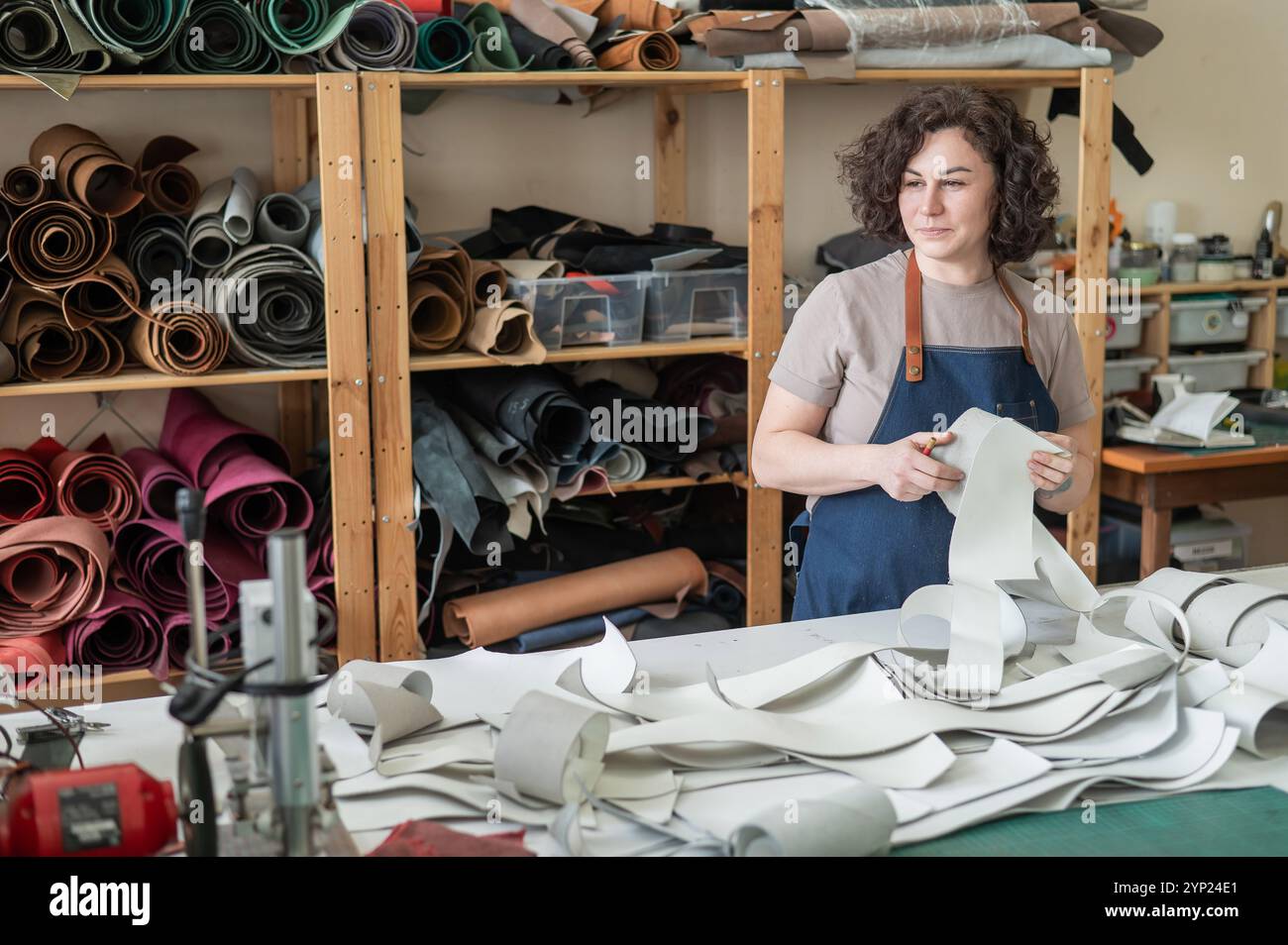Woman tanner at work in the workshop Stock Photo - Alamy