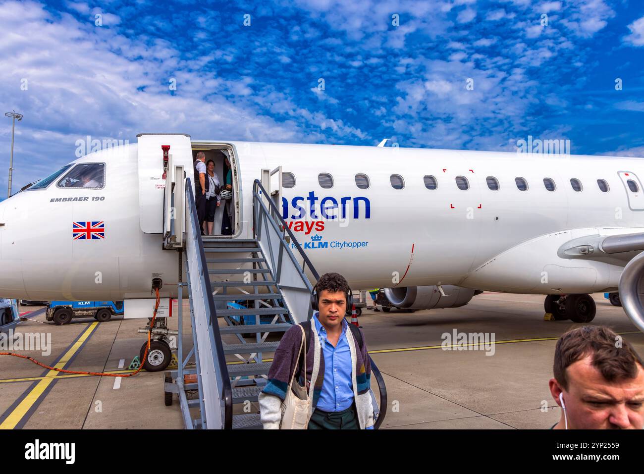 KLM Eastern flight and crew on tarmac at Schipol International Airport ...