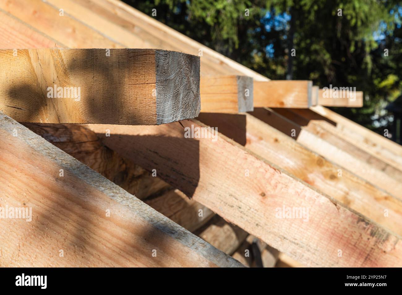 Wooden house roof details. Background photography with rafters and ...