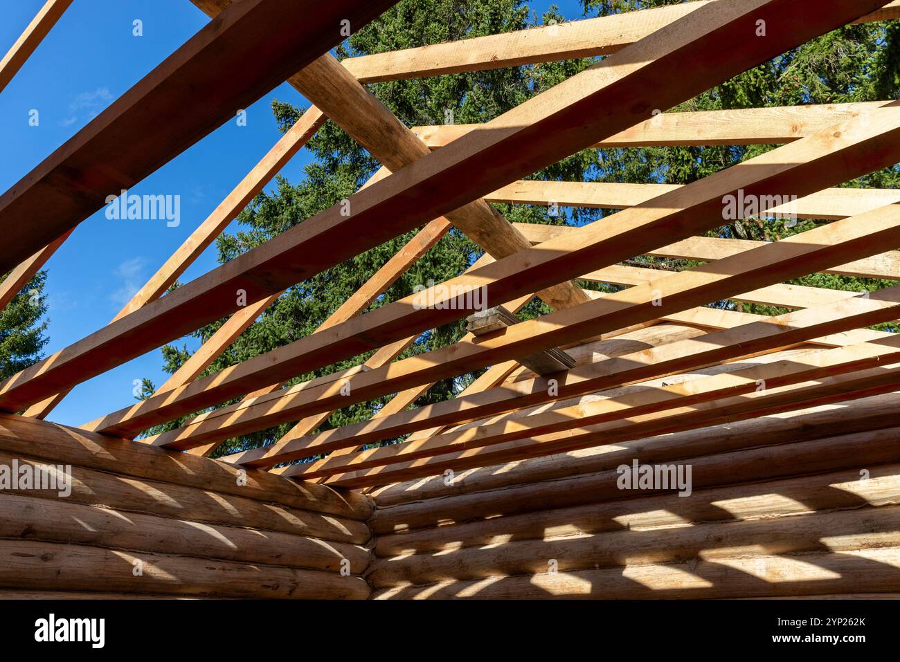 Intrerior of a log house under construction. New wooden house without ...