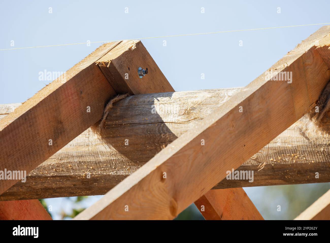 Details of a foor of wooden house under construction. Background photo ...