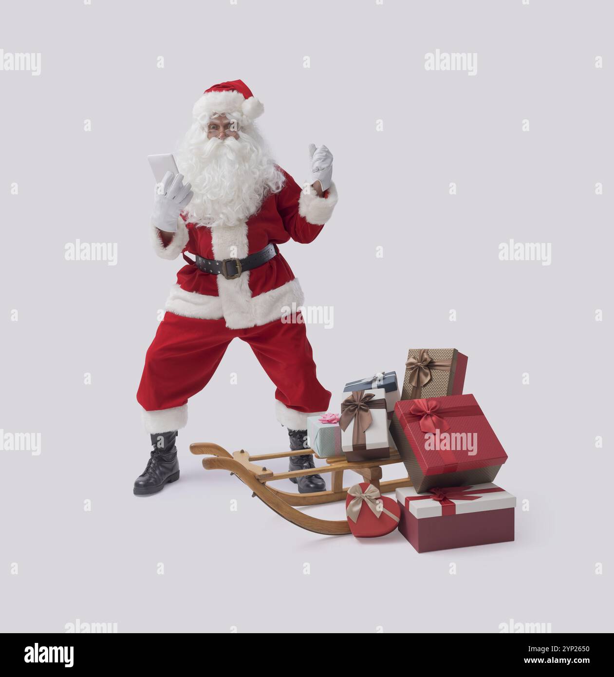 Angry Santa Claus delivering gifts and using a smartphone, the phone has no network connection ...