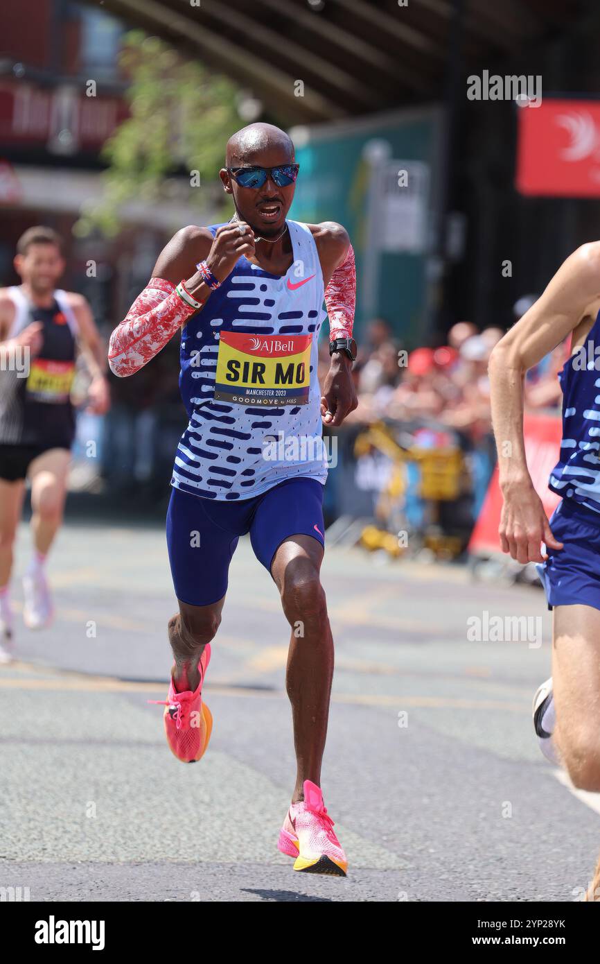 An inspiring action shot of Mo Farah racing with determination during ...